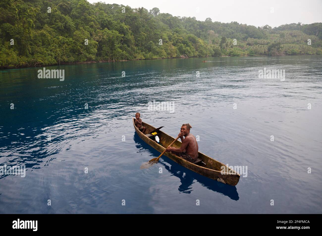 Indigenous people in monoboat, Russell Islands, Solomon Islands Stock ...