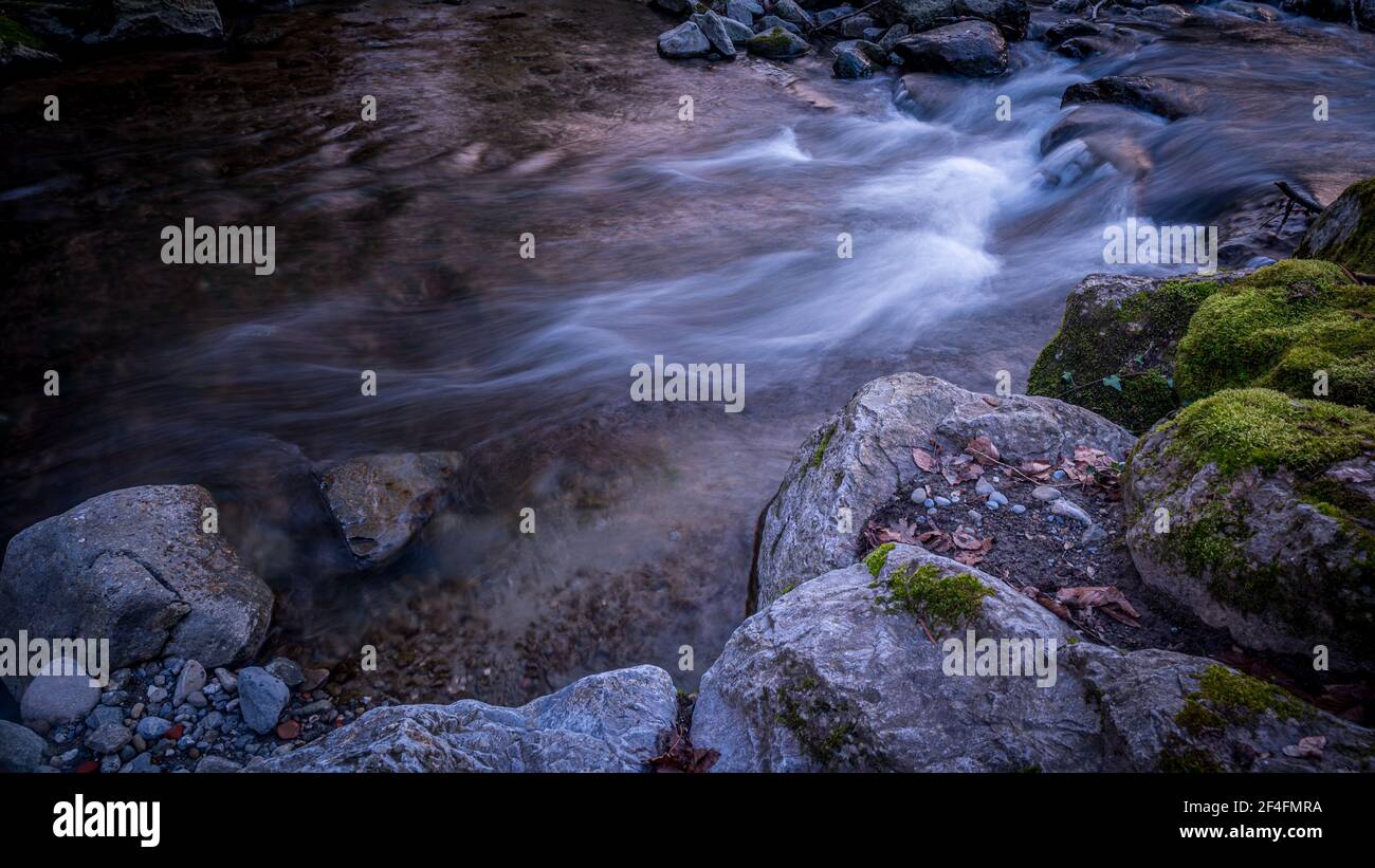 Water flowing over rocks. Beauty in nature. Long exposure. Lausanne ...