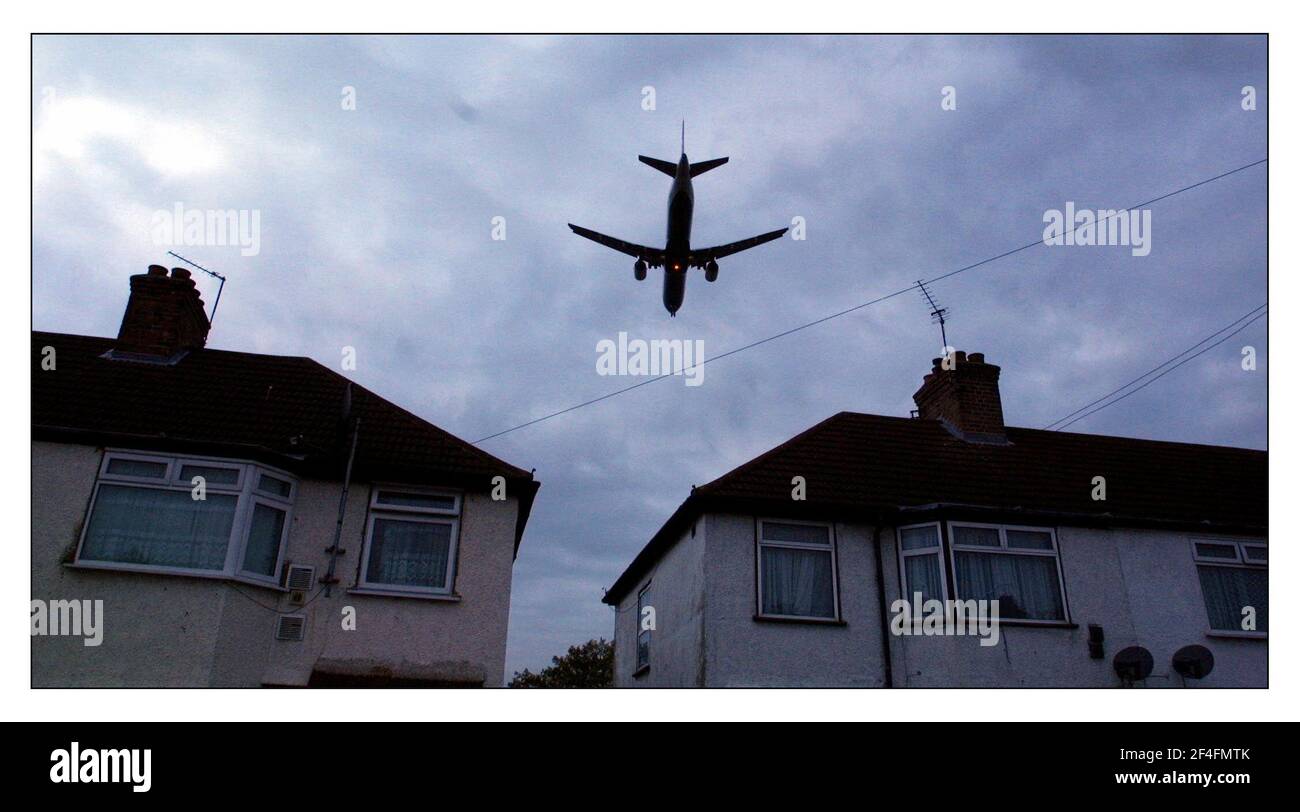 Planes landing at Heathrow over the houses of Houndslow. for use with ...