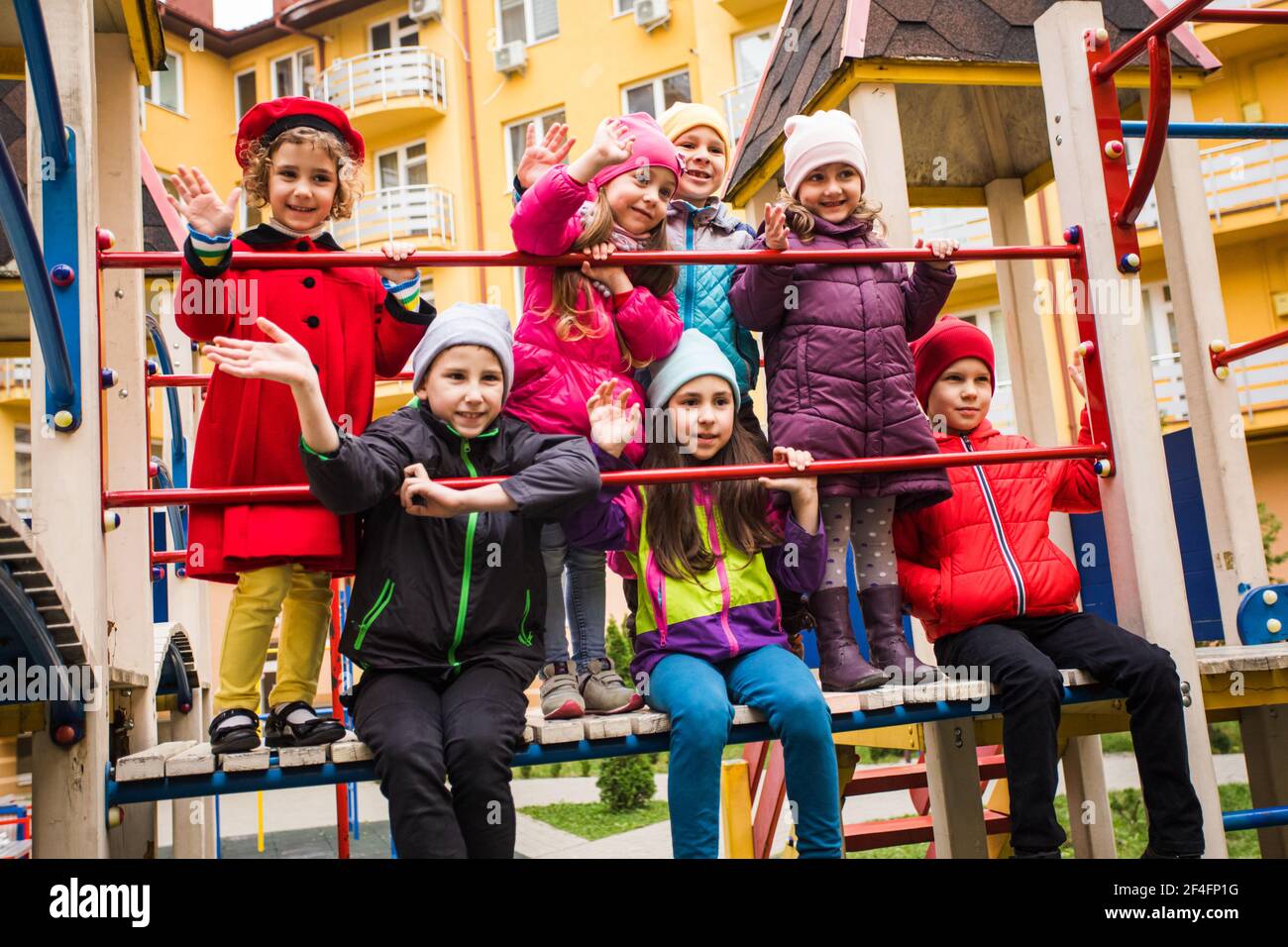Cheerful kids at outdoor playground in early spring Stock Photo - Alamy