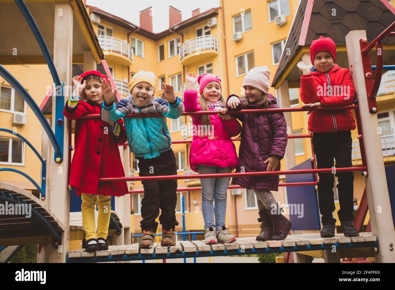 Group of kids walking on the playground Stock Photo - Alamy
