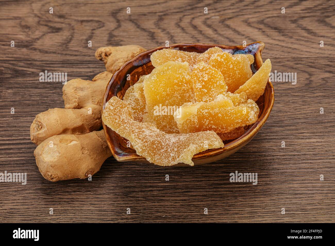 Dry sweet ginger snack in the bowl Stock Photo - Alamy