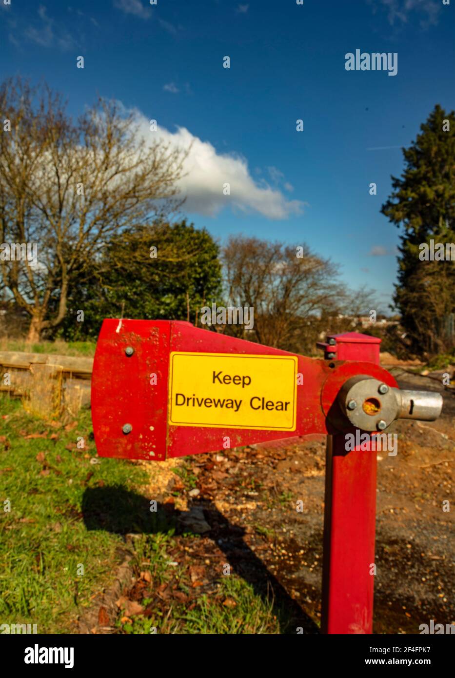 Very colourful road / instruction sign in red with yellow inset Stock ...