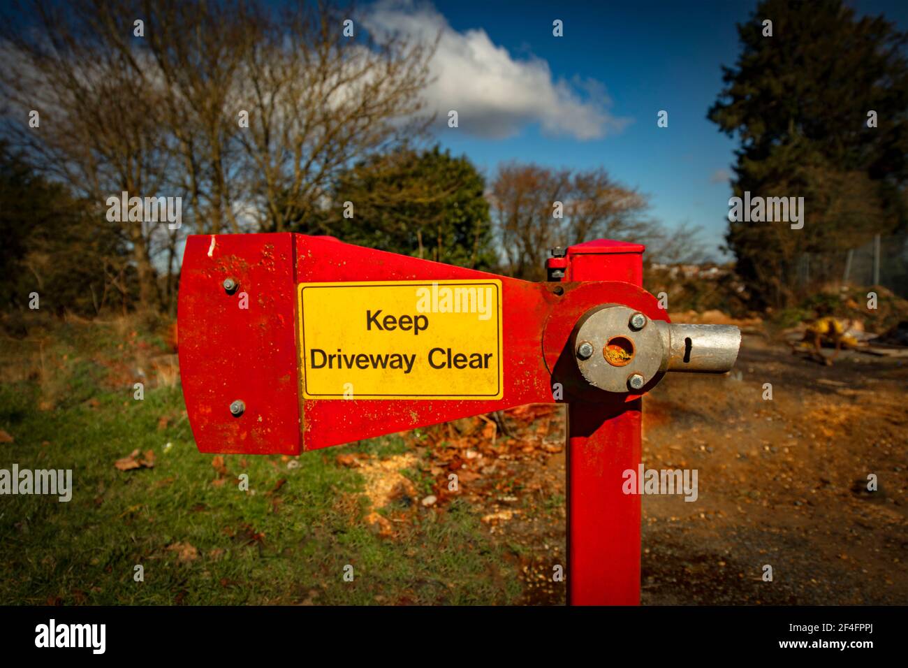 Very colourful road / instruction sign in red with yellow inset Stock ...