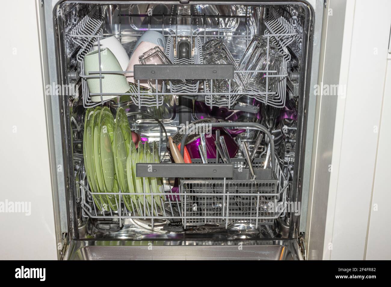 Dishwasher washing dishes inside view hi-res stock photography and ...