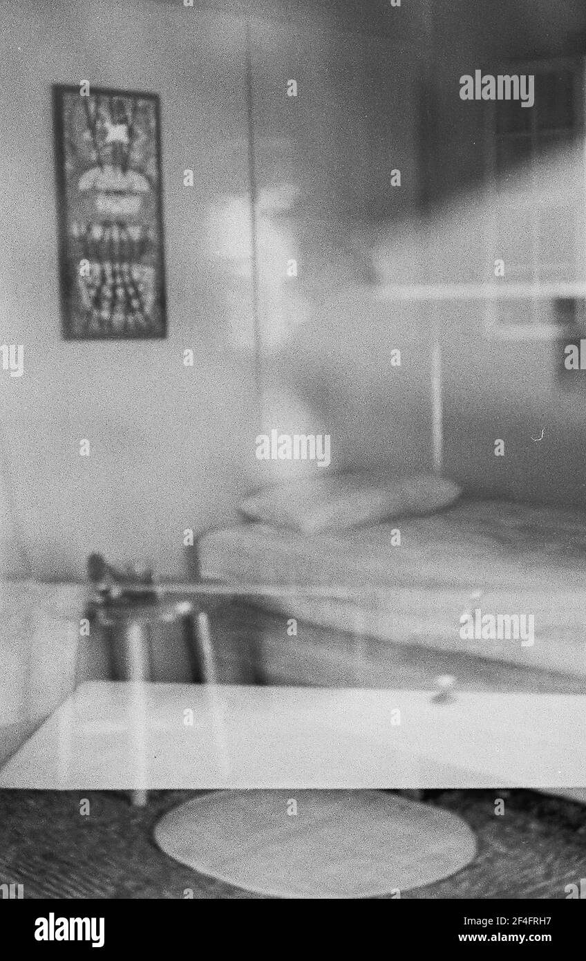 View of a typical lodge room, with a single-bed and stool, at La Guira ...