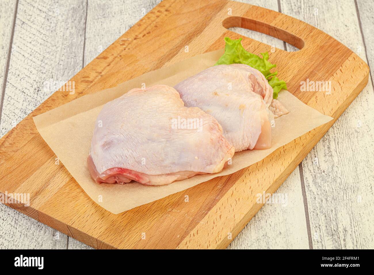 Raw chicken hip ready for cooking Stock Photo - Alamy