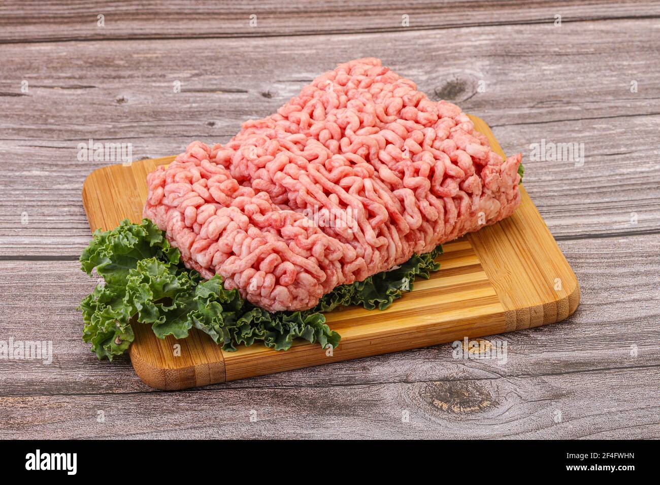 Raw pork minced meat with spices for cooking Stock Photo - Alamy