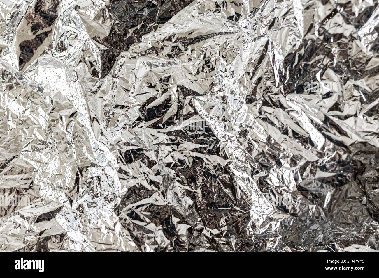 Texture of crumpled foil. Flat lay. Copy space Stock Photo - Alamy