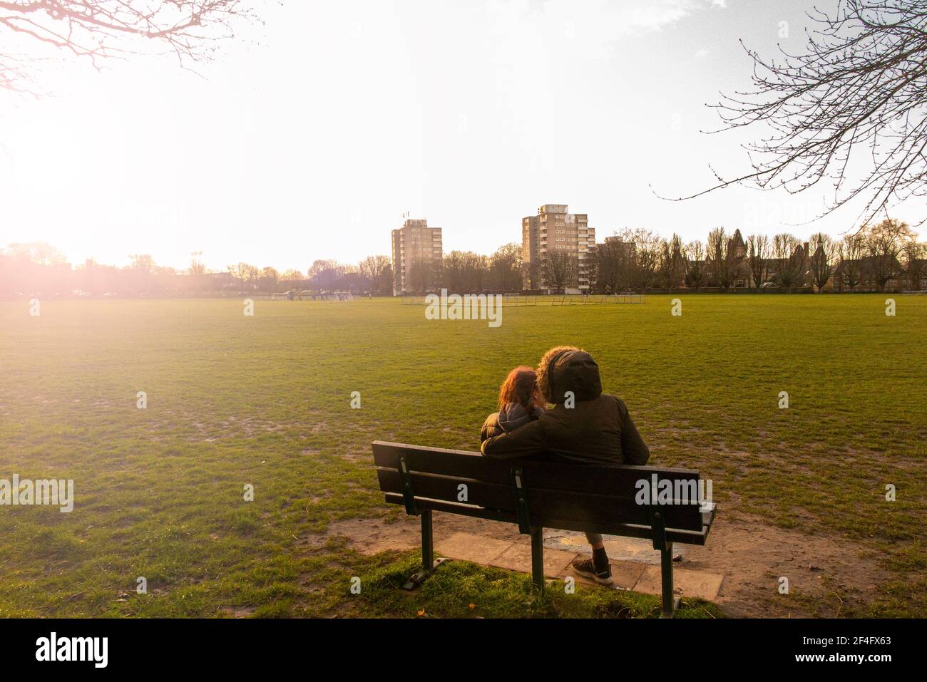Girl rear view park bench hi-res stock photography and images - Alamy