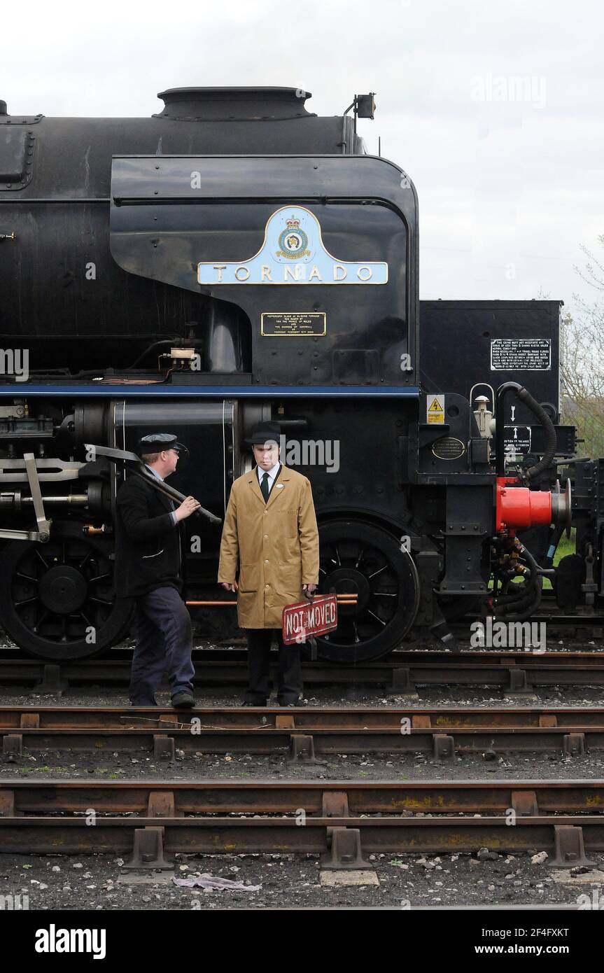 Fireman and foreman alongside "Tornado Stock Photo - Alamy