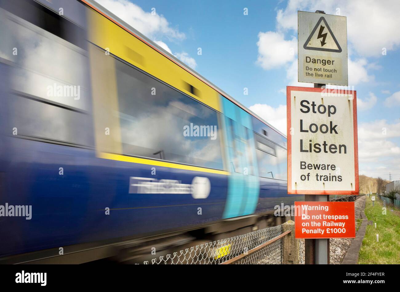 Landscape image of signage by train tracks in Sturry, Kent, displaying ...
