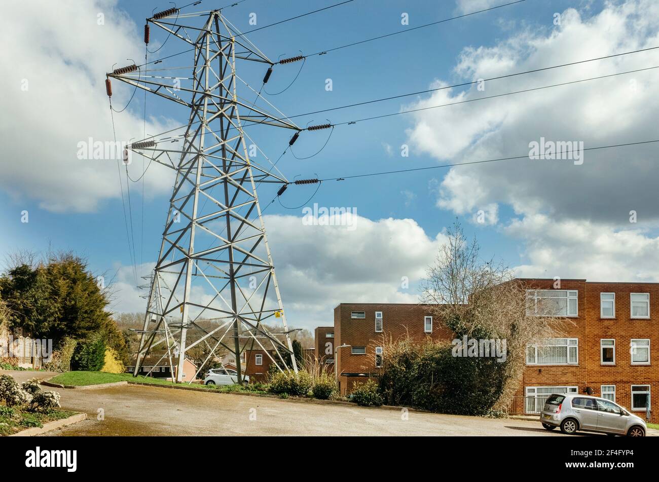 Landscape image of large Pylon next to housing in Sturry, Kent Stock ...