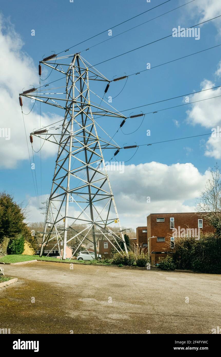 Portrait image of large Pylon next to housing in Sturry, Kent Stock ...