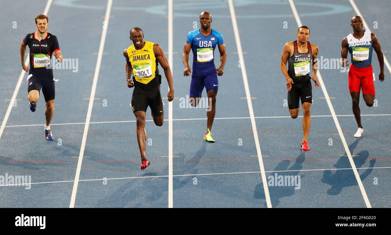 Usain Bolt of Jamaica running wins gold medal 200m sprint race Rio 2016 ...