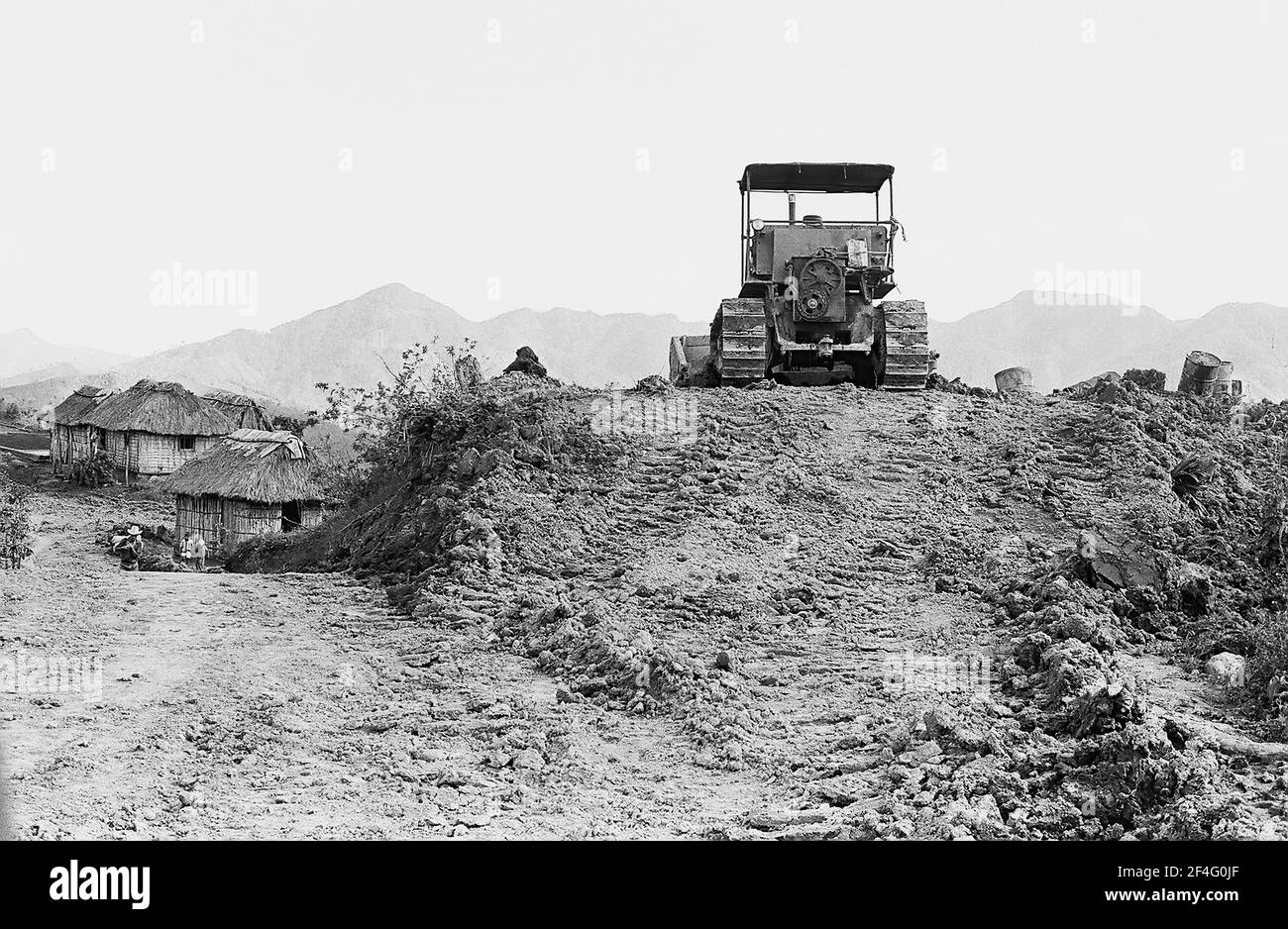Road repairs after Hurricane Flora, Cuba, Holguin province, 1963. From ...