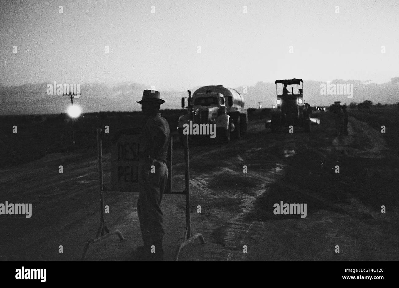 Road repairs after Hurricane Flora, Cuba, Holguin province, 1963. From ...