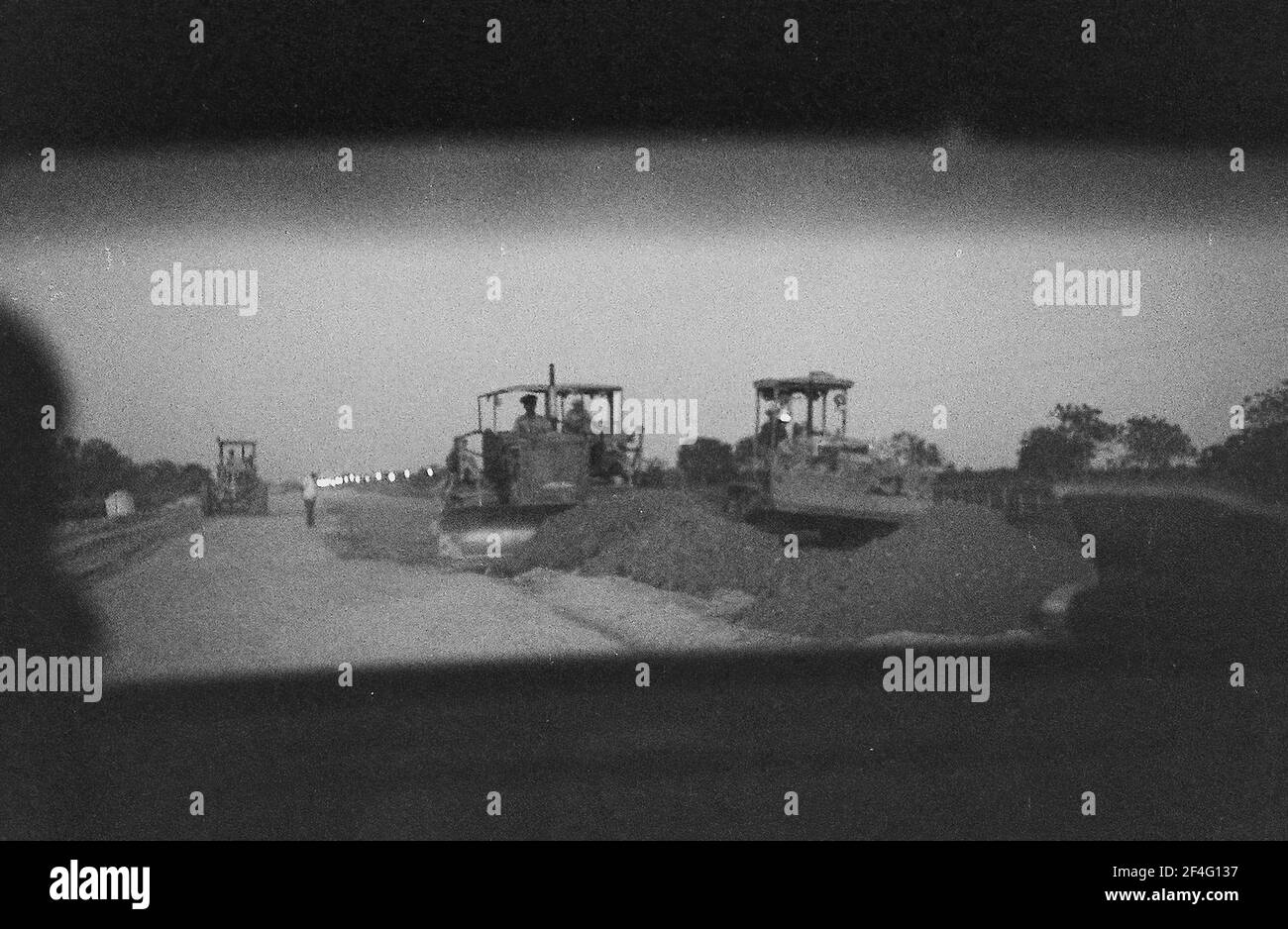 Road repairs after Hurricane Flora, Cuba, Holguin province, 1963. From ...