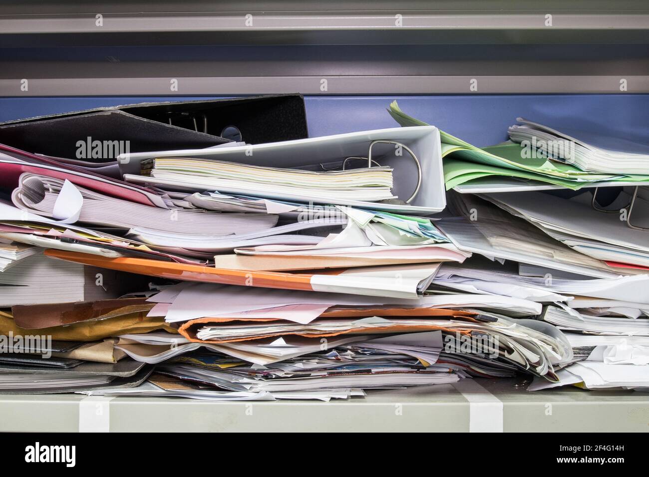 Messy file document and Office Supplies in filing cabinets at work ...
