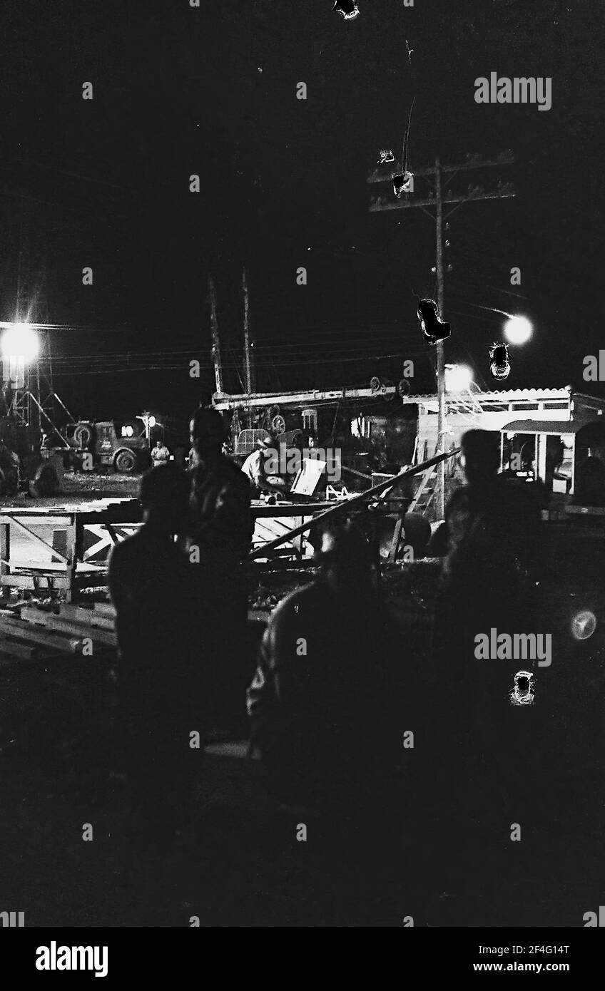 Road repairs at night after Hurricane Flora, Cuba, Holguin province ...
