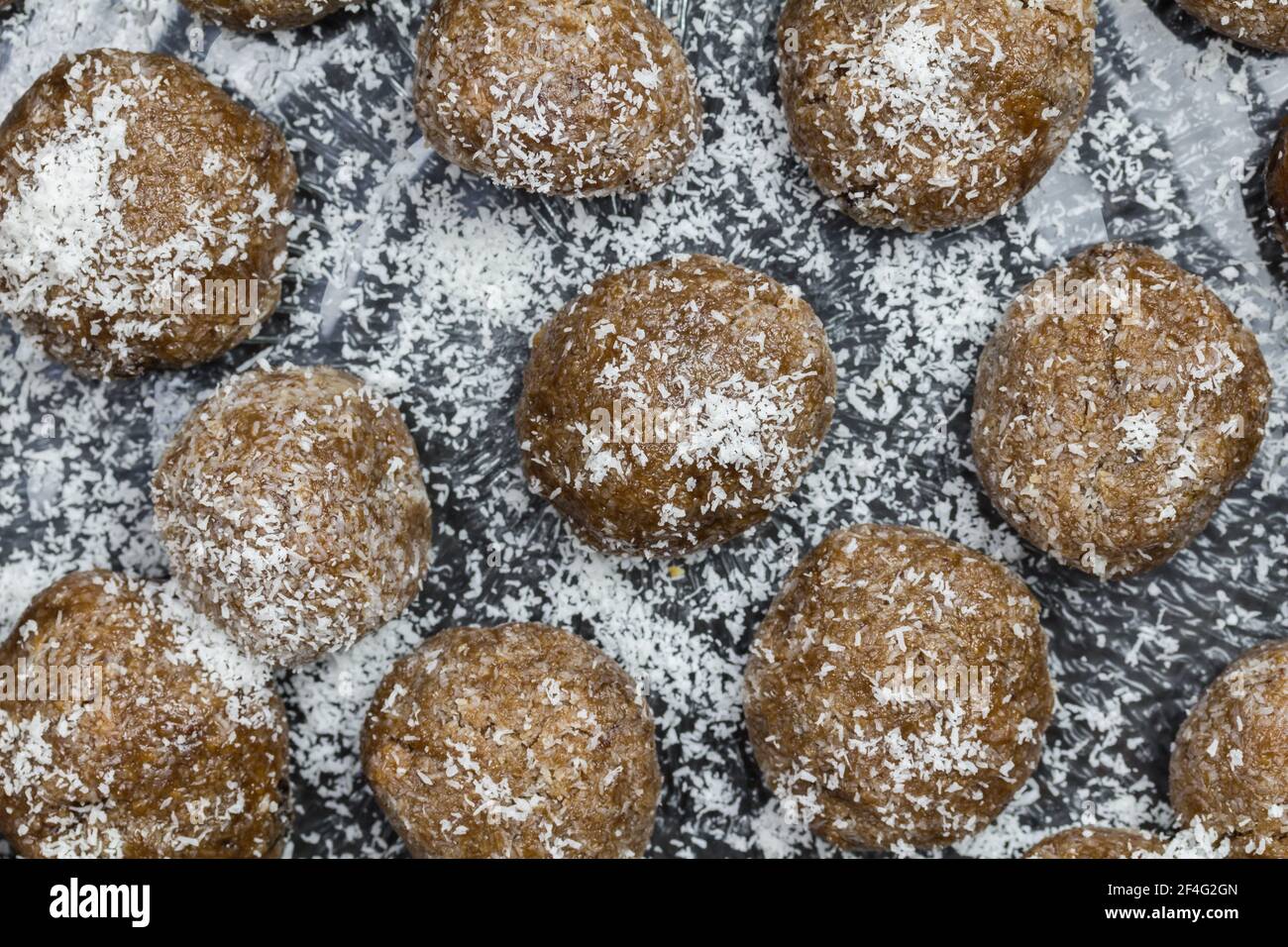 Date balls close up with coconut sprinkles - top view photo of ...