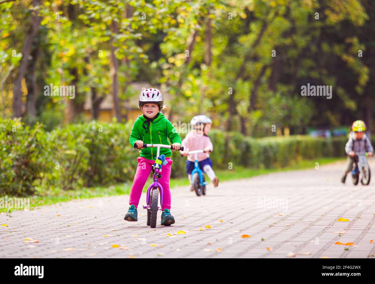 Kids striving to win while cycling competition Stock Photo - Alamy