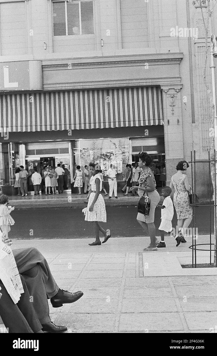 People standing sidewalk Black and White Stock Photos & Images - Alamy