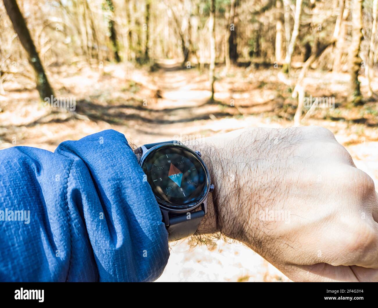 Compass on a smartwatch used for orienteering activity Stock Photo - Alamy