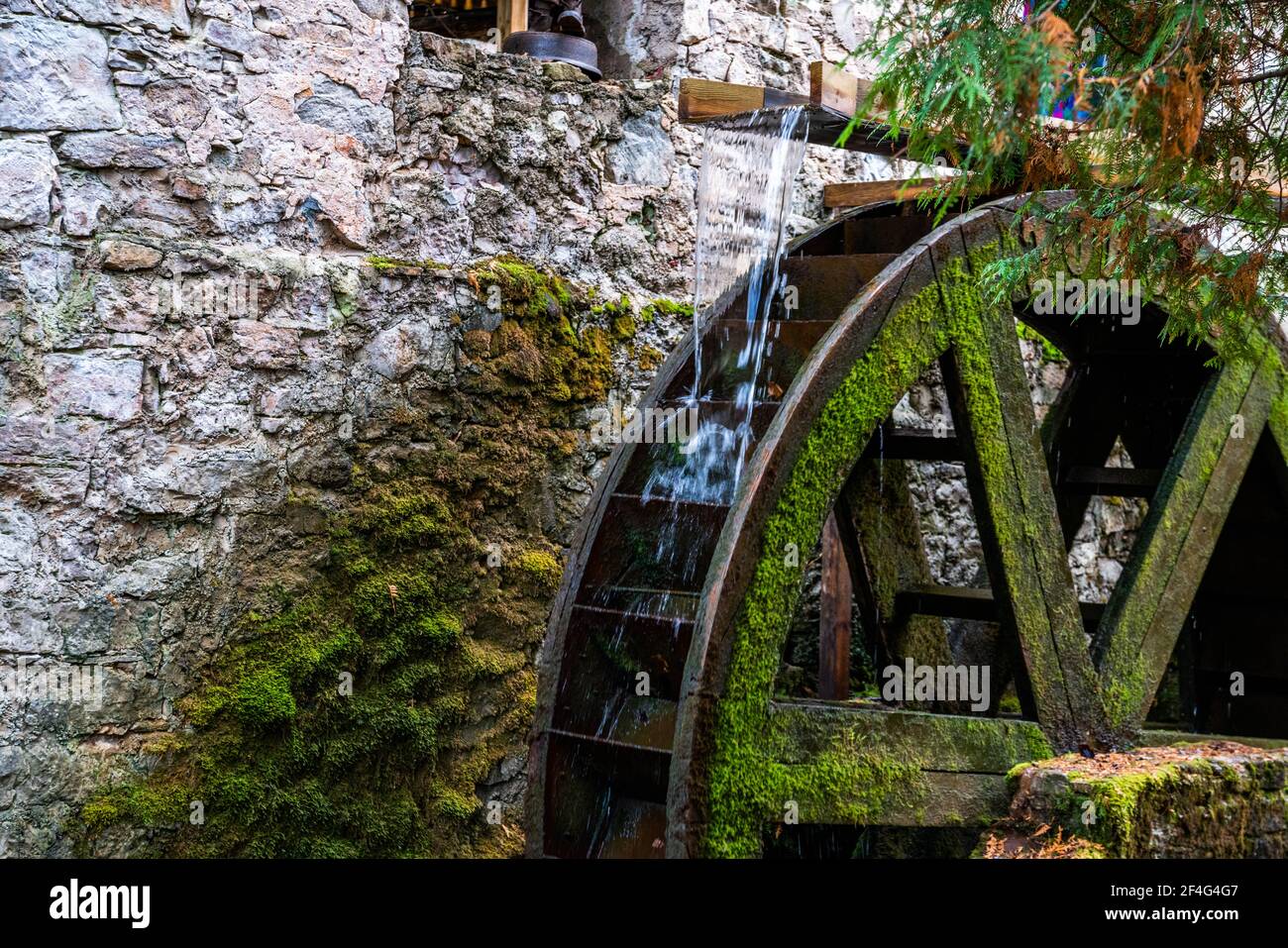 Waterfalls of Ieriku nature park at old watermill in the forest. It's a ...
