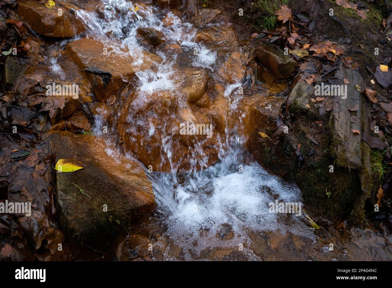 Waterfalls of Ieriku nature park at old watermill in the forest. It's a ...