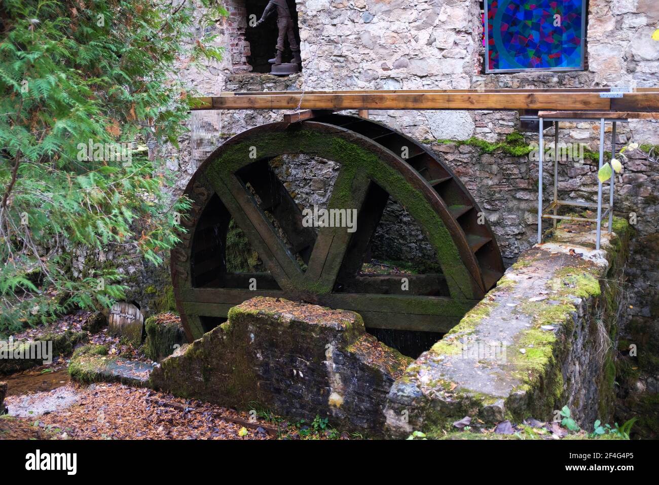 Waterfalls of Ieriku nature park at old watermill in the forest. It's a ...