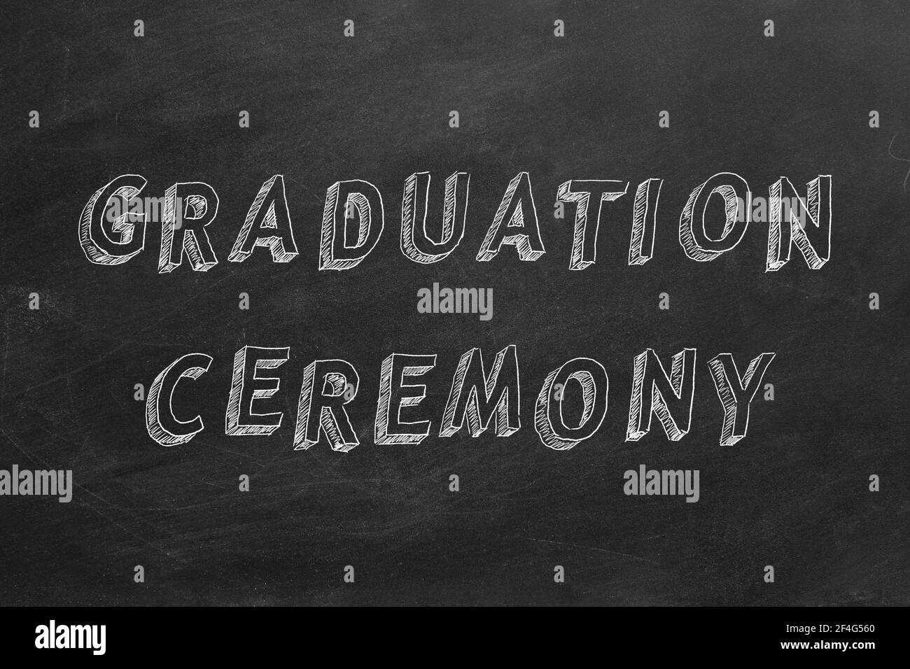Hand drawing text "Graduation ceremony" on blackboard Stock Photo - Alamy