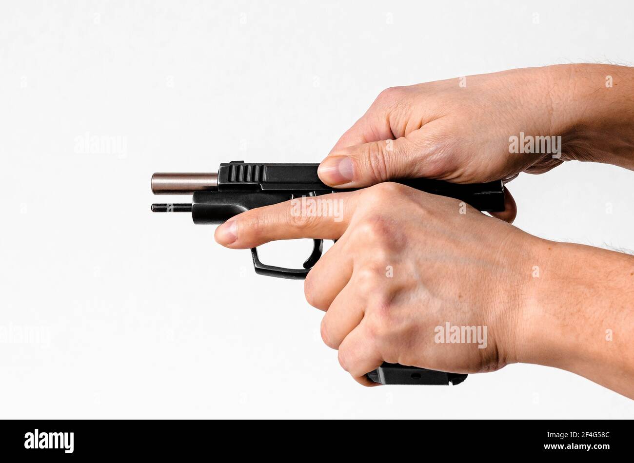 Pistol, or Auto-Loader Short gun in female's hand preparing or self ...