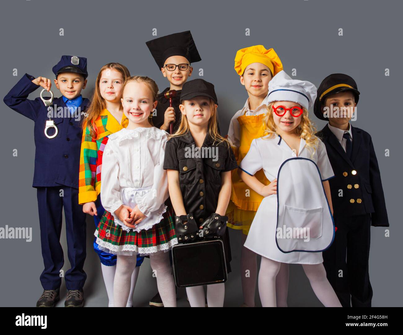 Little kids dressing up as professions. Future education Stock Photo ...