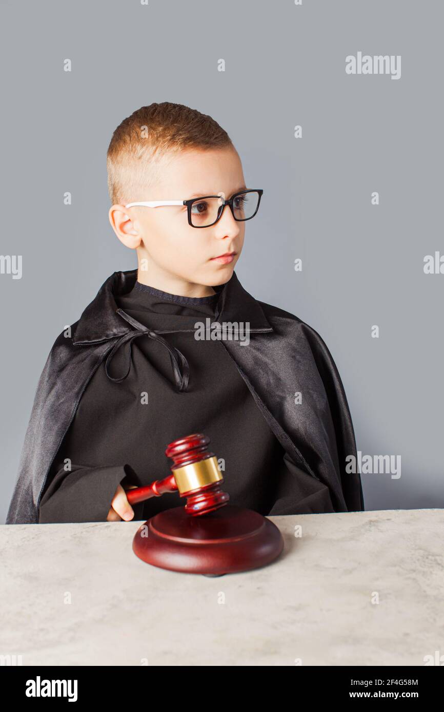 Portrait of serious boy judge makes a decision Stock Photo - Alamy