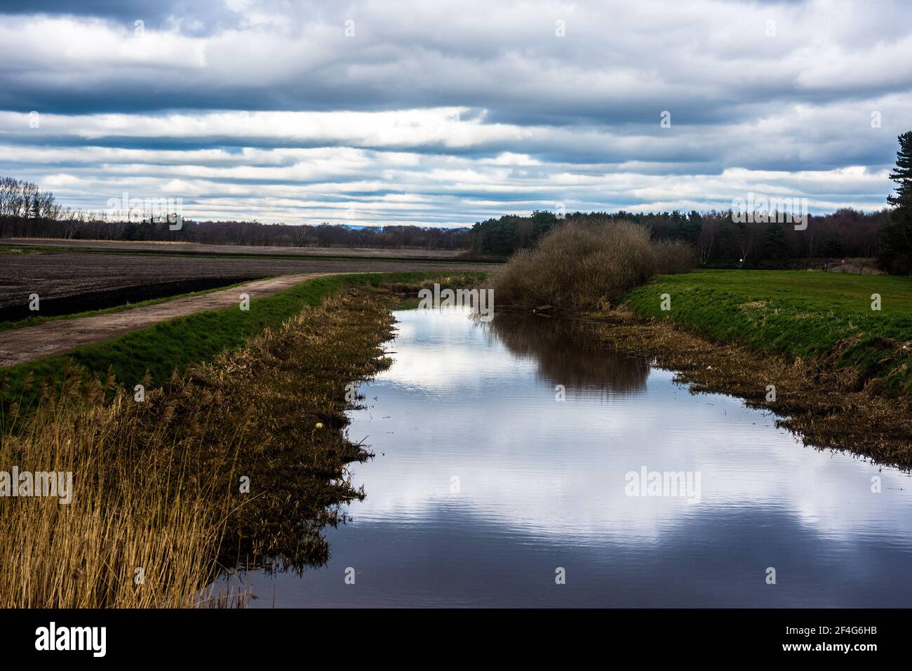 This waterway is wide and shallow and forms the boundary between Sefton ...