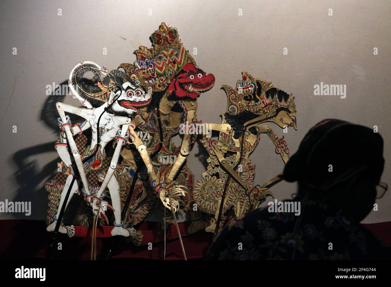 Puppet master (dalang) performs the wayang kulit performance 'The Death ...