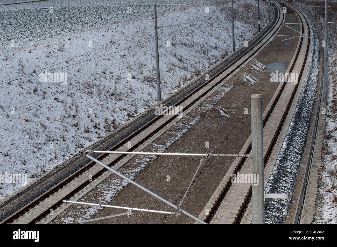 railway tracks under construction with cement sleepers and electric ...