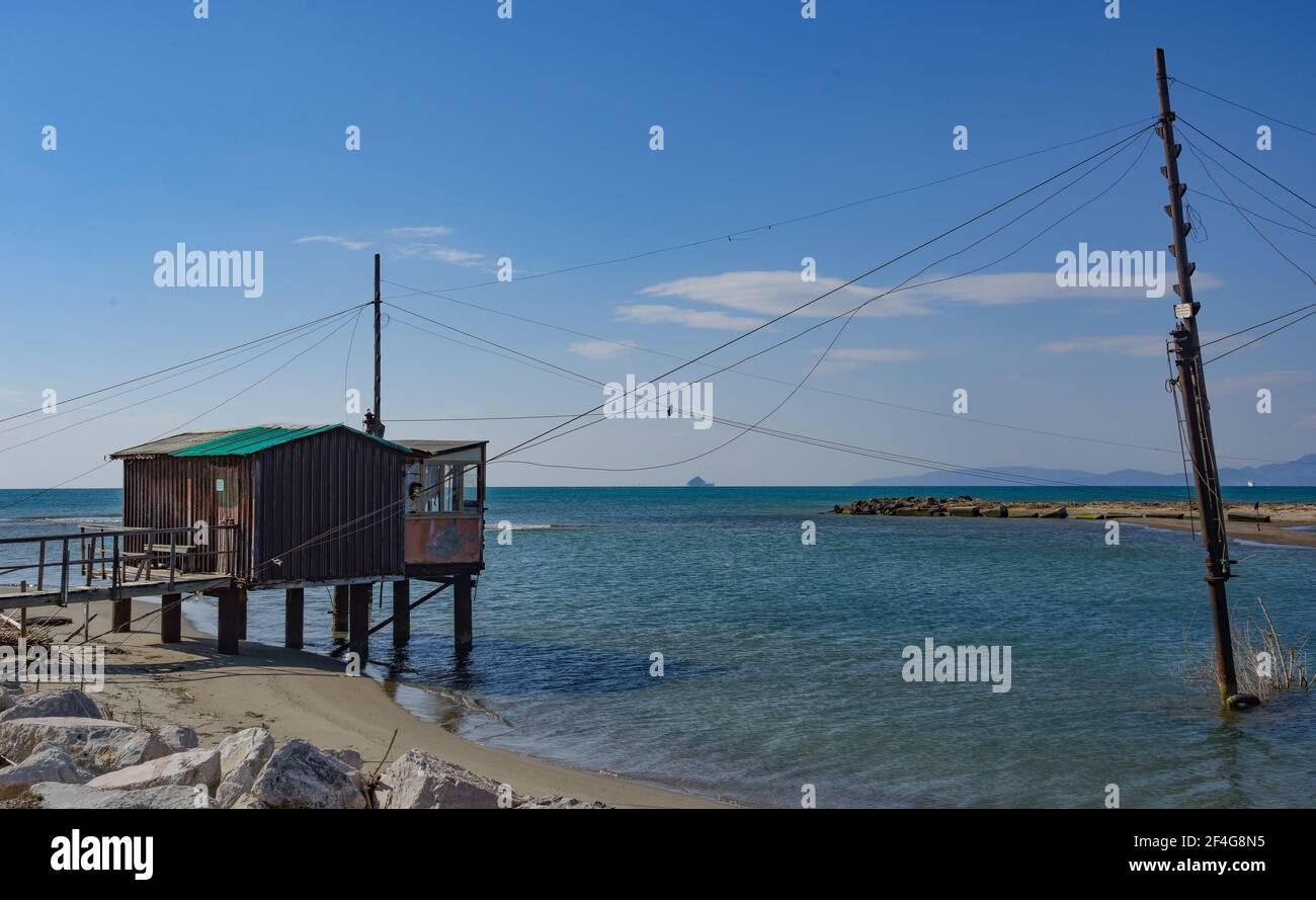 Wooden hut for slingbar fishing net Stock Photo - Alamy
