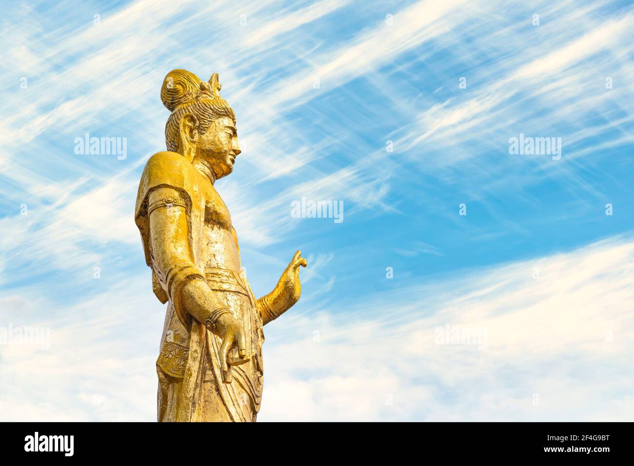 tokyo, japan - march 15 2021: Side view of the Buddhist golden statue ...