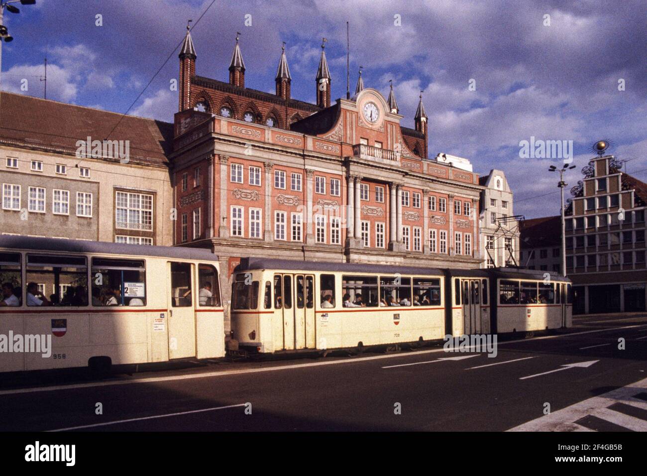 A tram in front of Rostock town hall in 1990 Stock Photo - Alamy