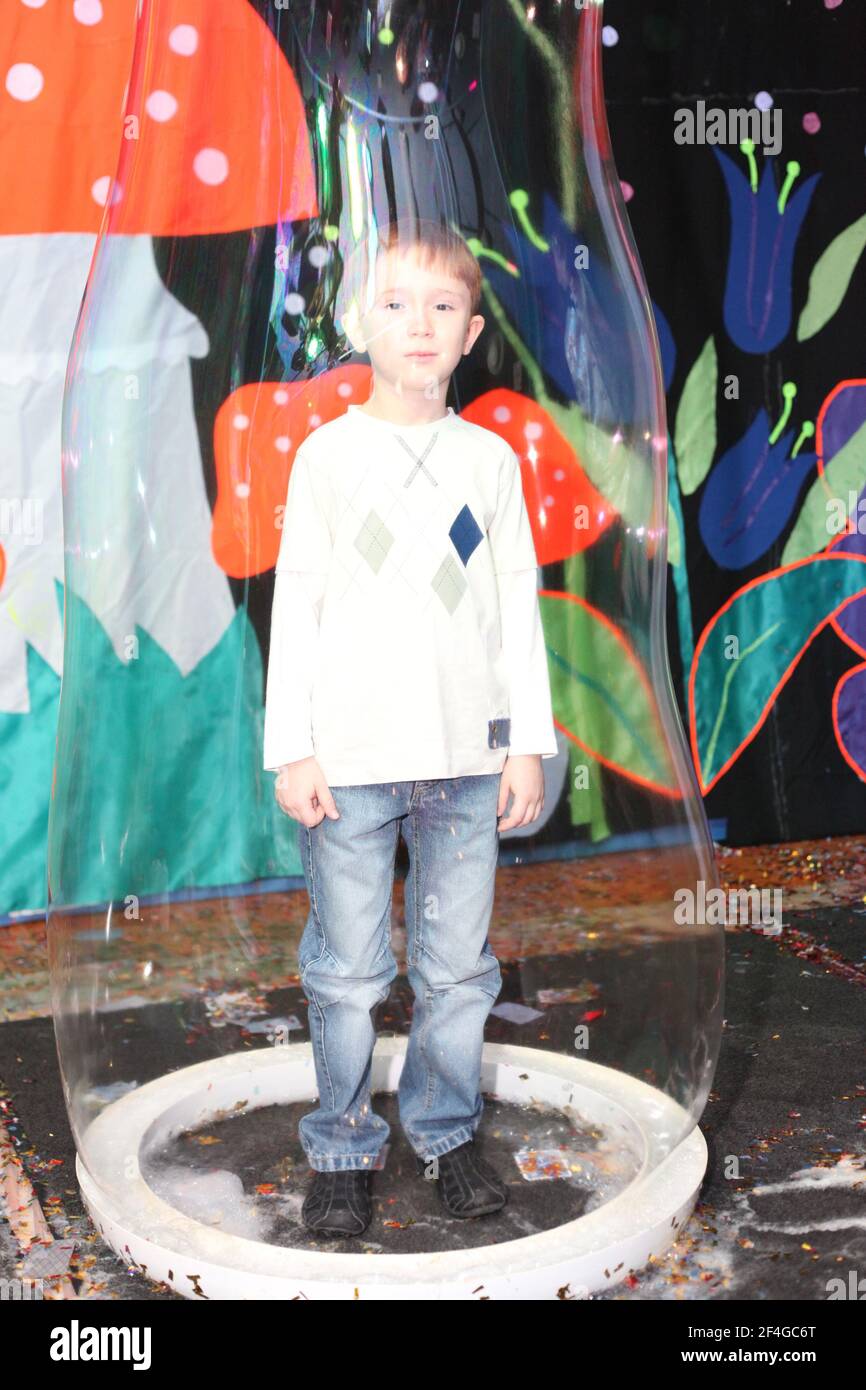 cute little boy inside the soap bubble Stock Photo - Alamy