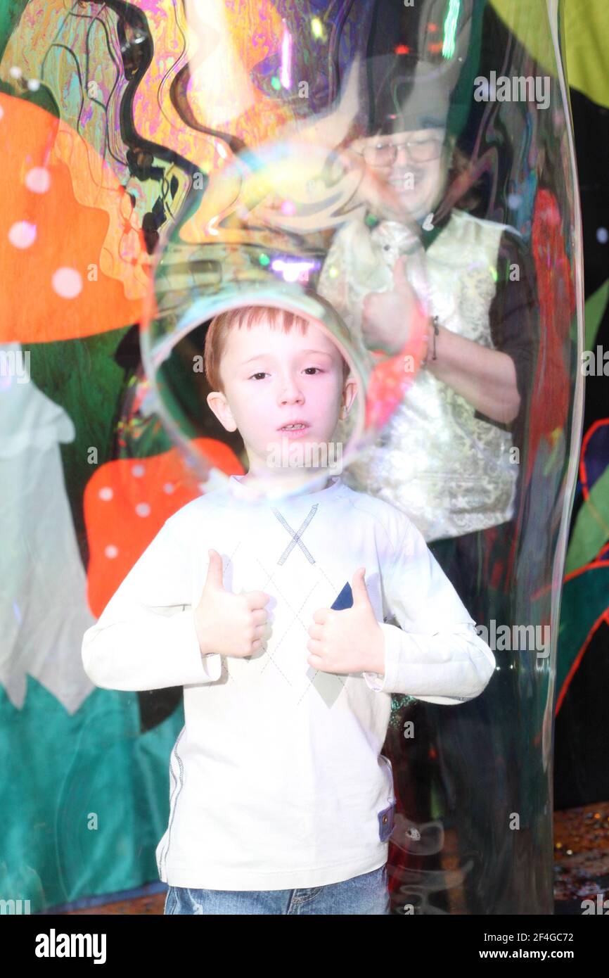 cute little boy inside the soap bubble Stock Photo - Alamy