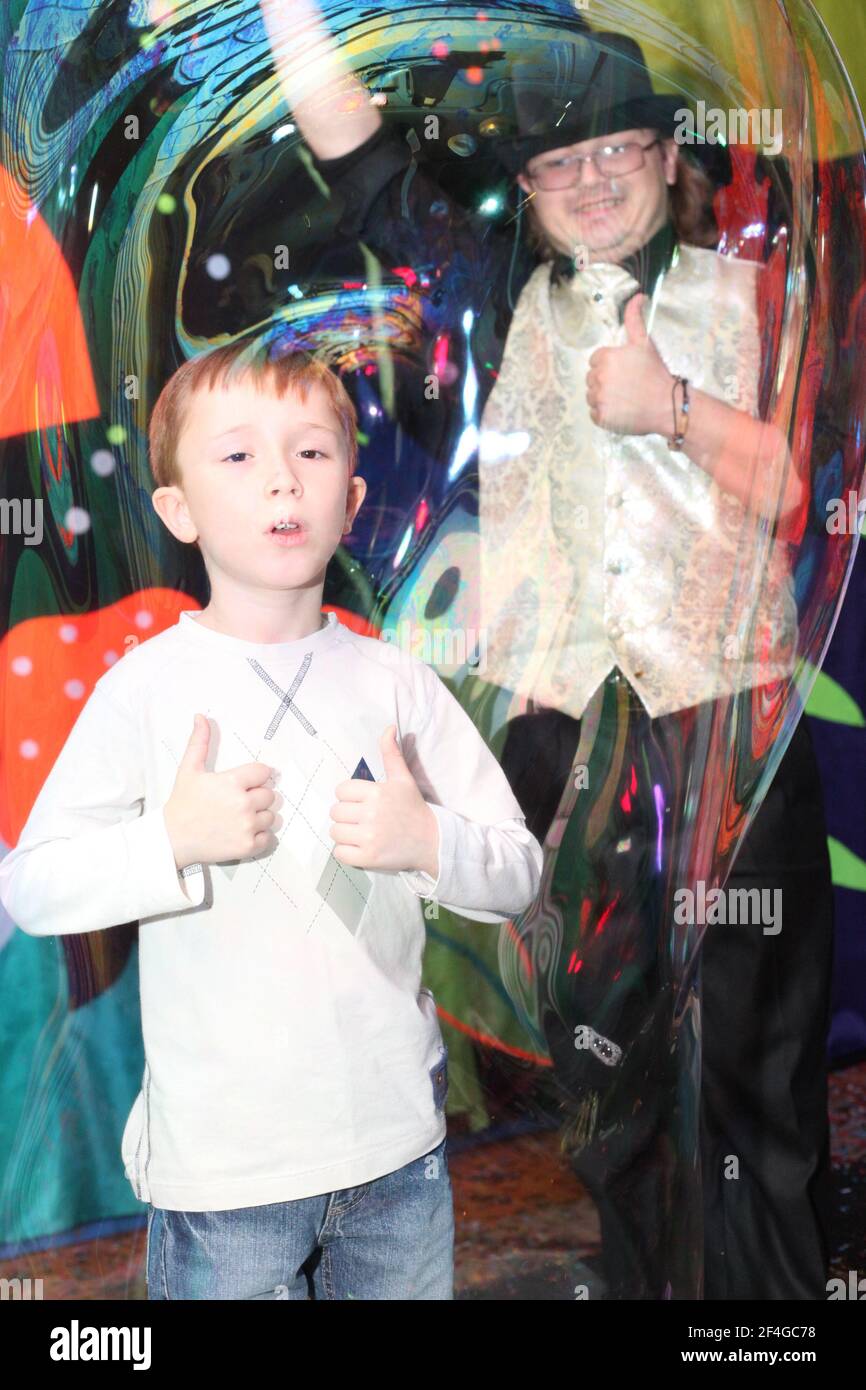 cute little boy inside the soap bubble Stock Photo - Alamy