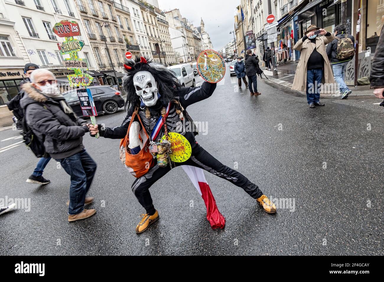 Paris, France. 18th Mar, 2021. Activist attends the commemoration of ...