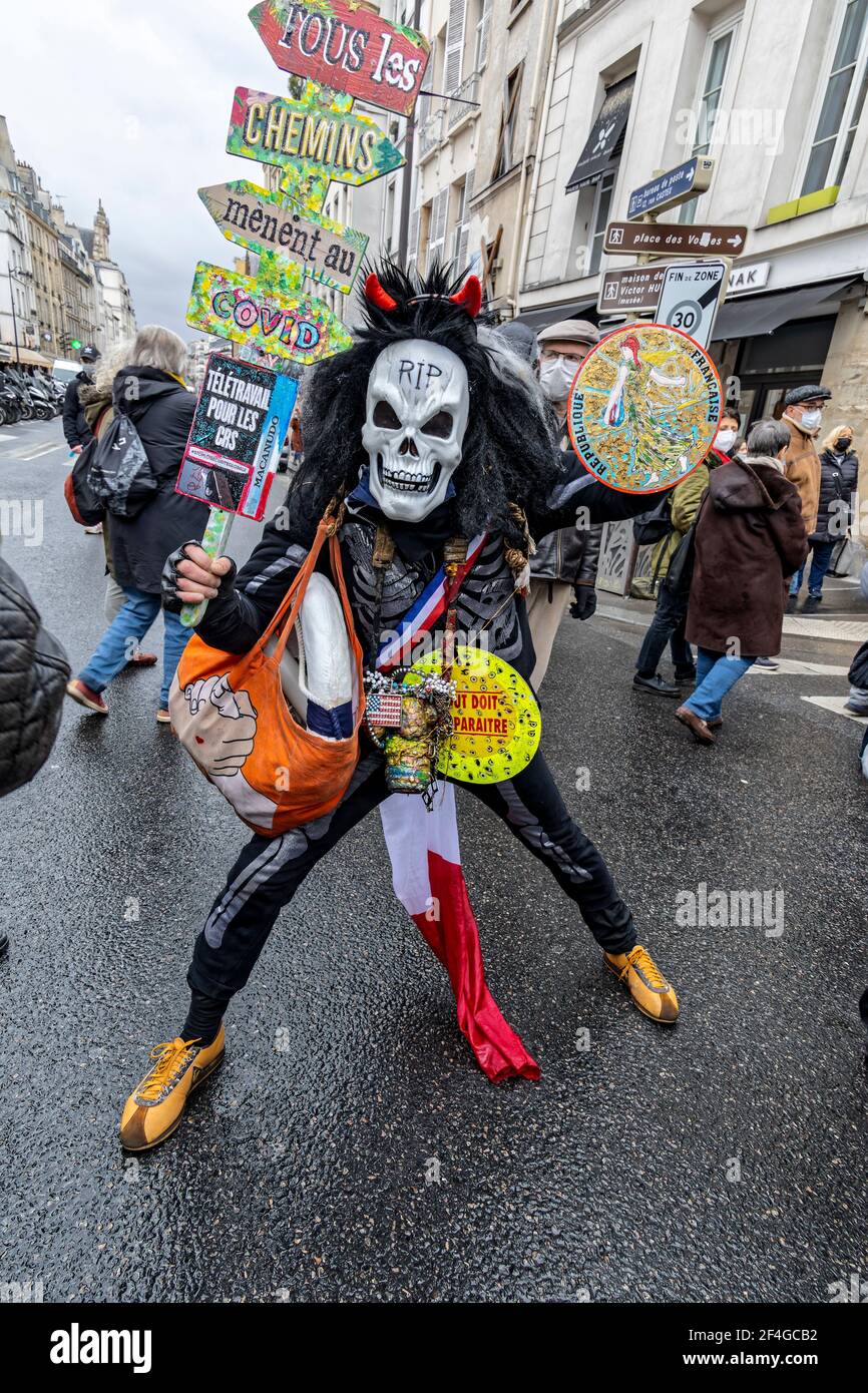 Paris, France. 18th Mar, 2021. Activist attends the commemoration of ...