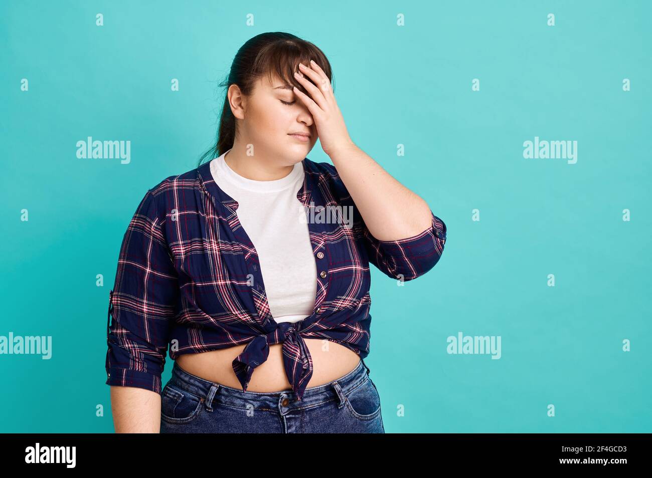 Frustrated overweight woman, body positive Stock Photo - Alamy