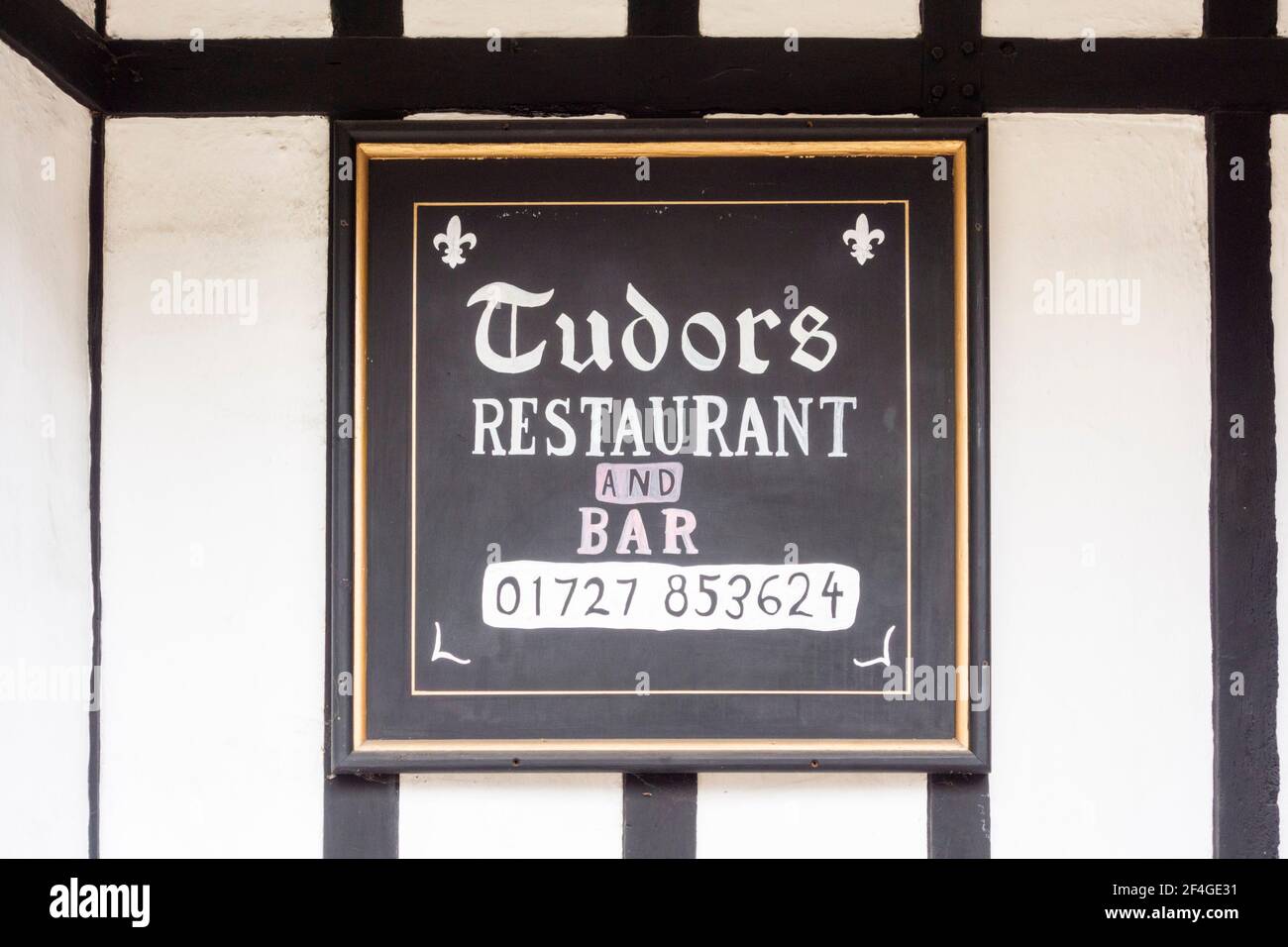 Tudors restaurant and bar sign white hart hotel st albans hi-res stock ...