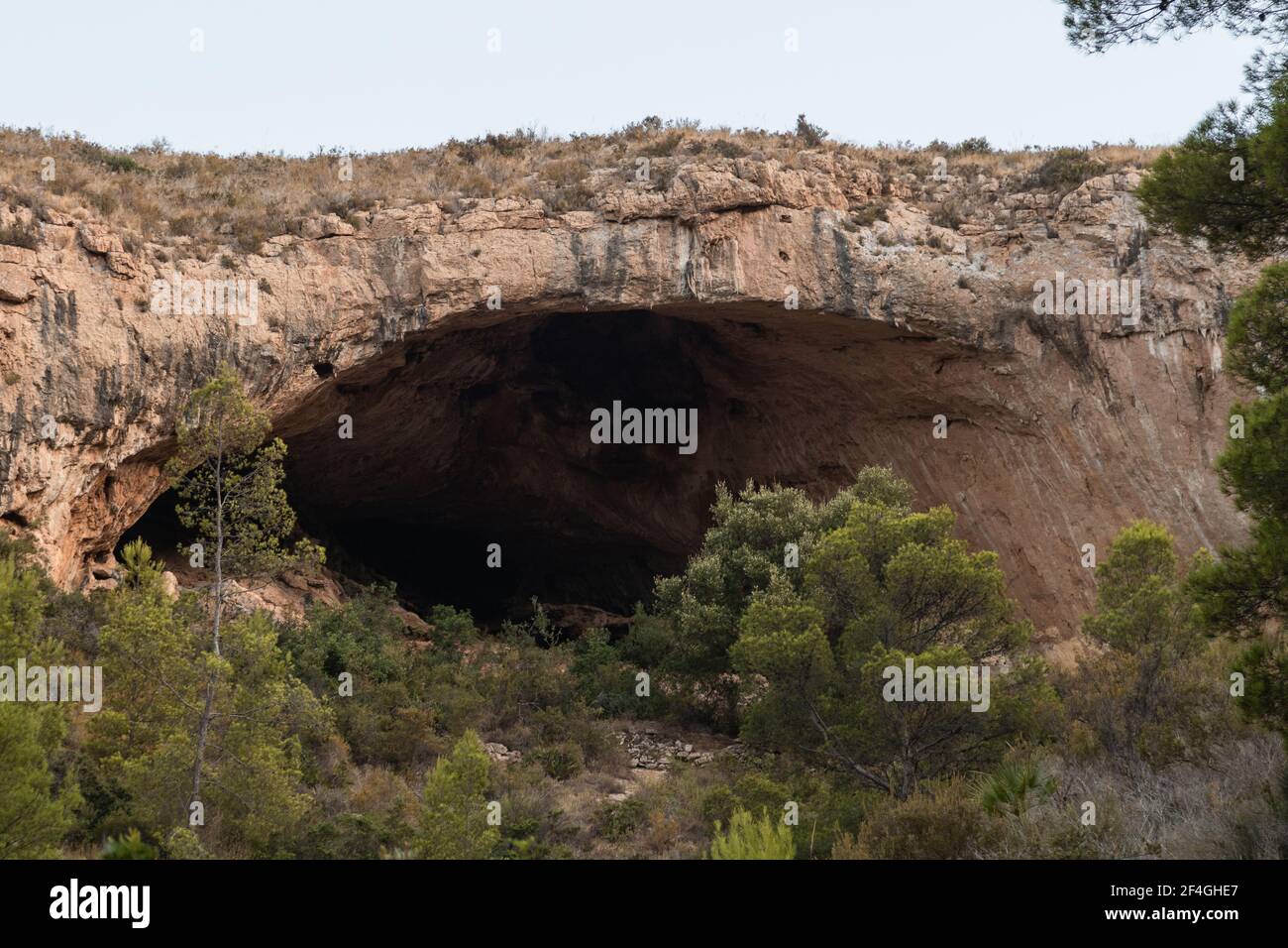natural cave of the path to faro de albil, benidorm. it has shape of ...