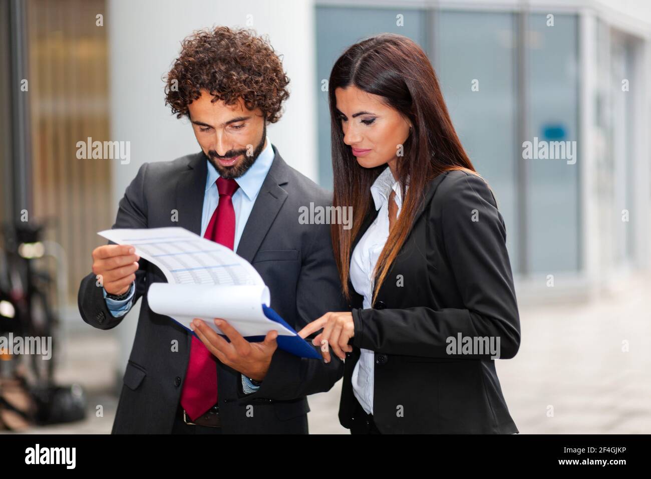 Executive business people reading documents hi-res stock photography ...